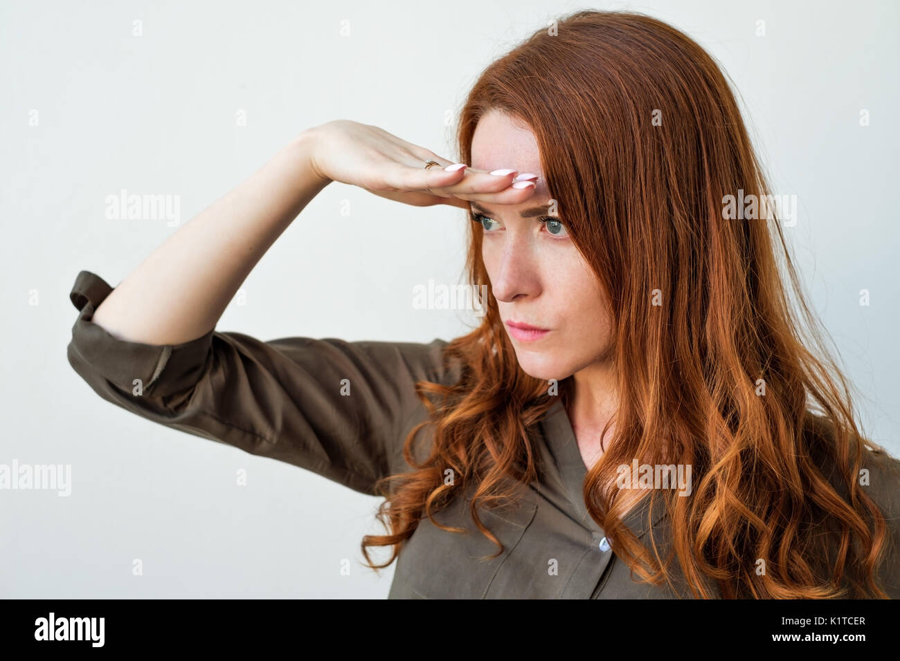 Woman looking into distance far away hi-res stock photography and ...