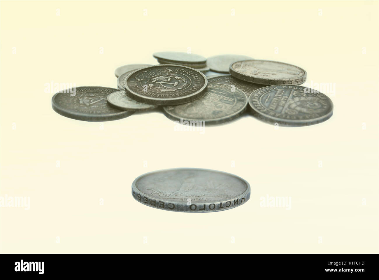 A bunch of old Russian coins of silver, of different denominations on a ...