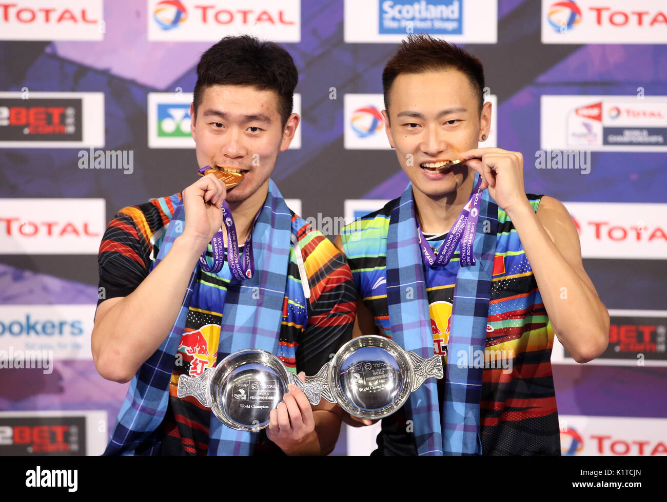 China's Liu Cheng (left) and Zhang Nan on the podium after winning gold ...