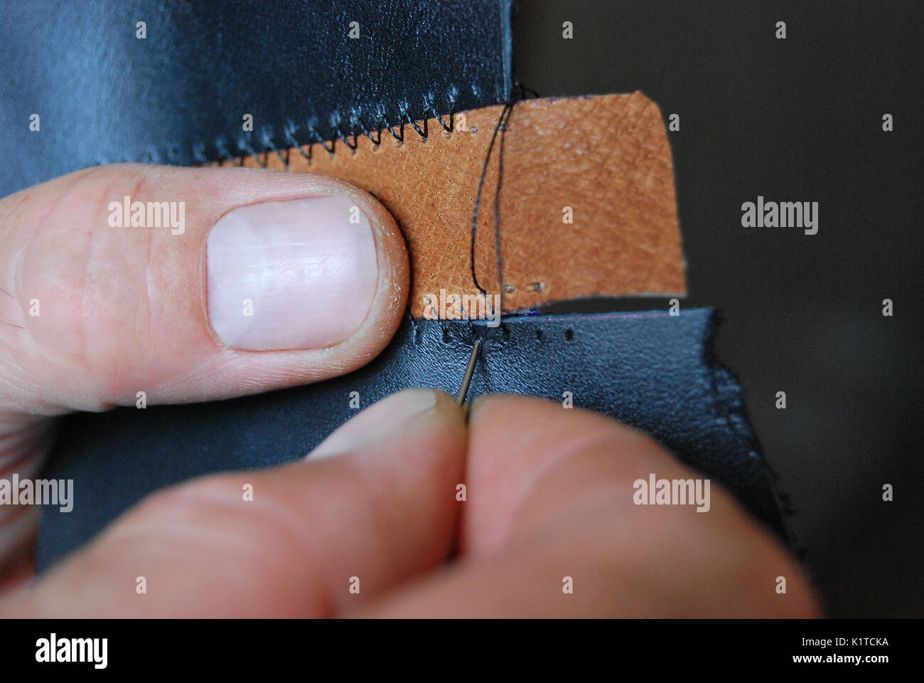The process of manual sewing of the skin with a needle Stock Photo - Alamy