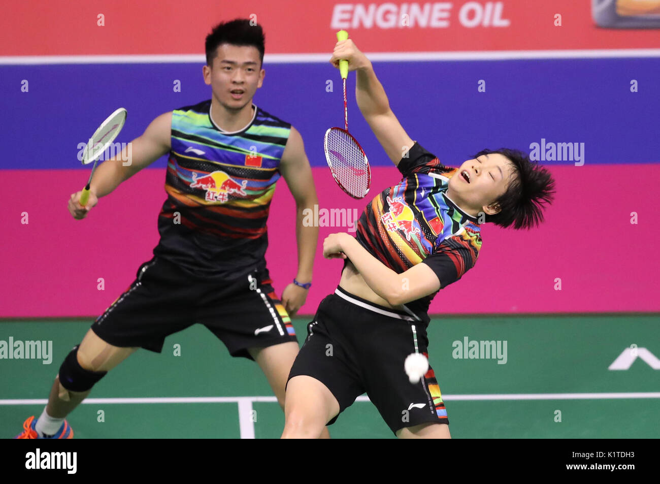 China's Zheng Siwei (left) and Chen Qingchen in the mixed doubles final ...