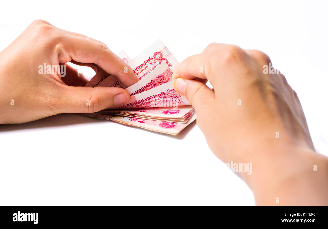 Female hands counting money in Chinese yuan isolated Stock Photo - Alamy