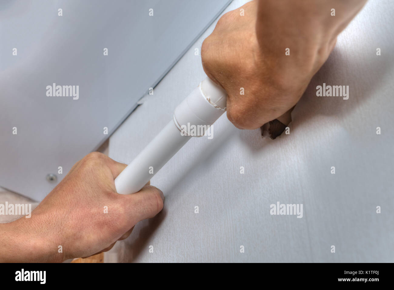 Installation water pipe on the wall, connect ppr plastic pipes, worker ...