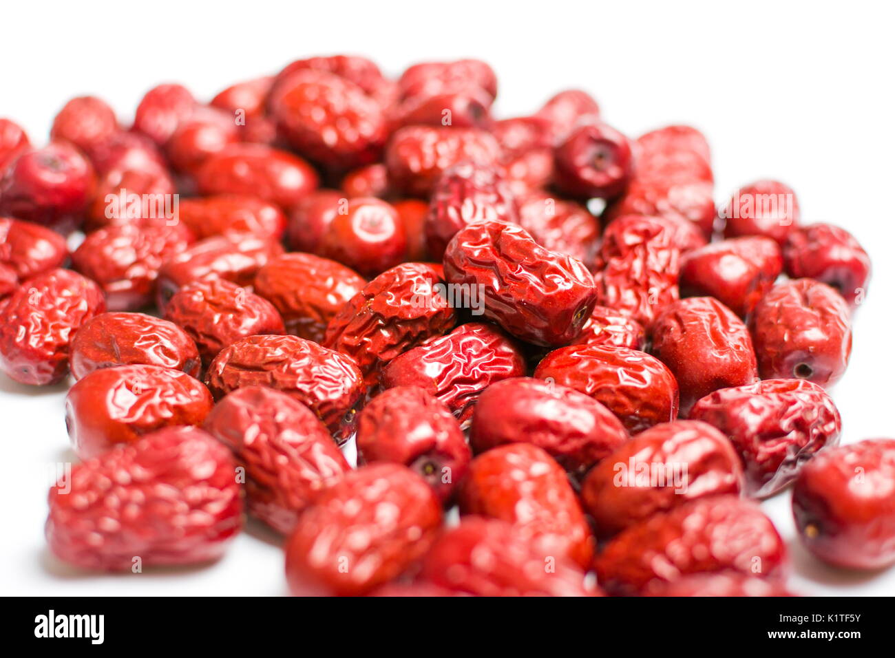 Jujube, Chinese dried red date fruit on white Stock Photo - Alamy