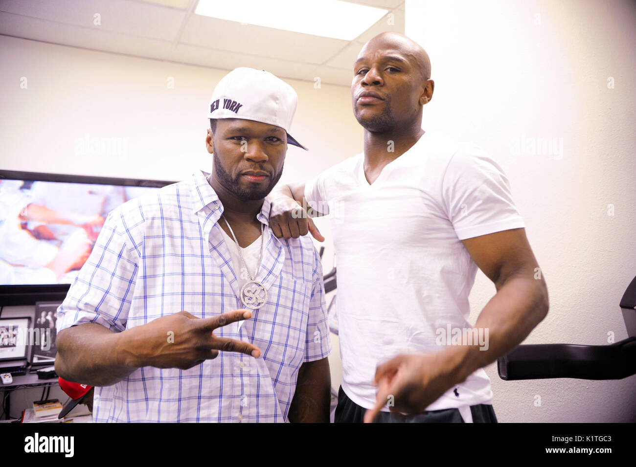 Boxer Floyd Mayweather Jr. Rapper Curtis Jackson aka 50 Cent portrait ...