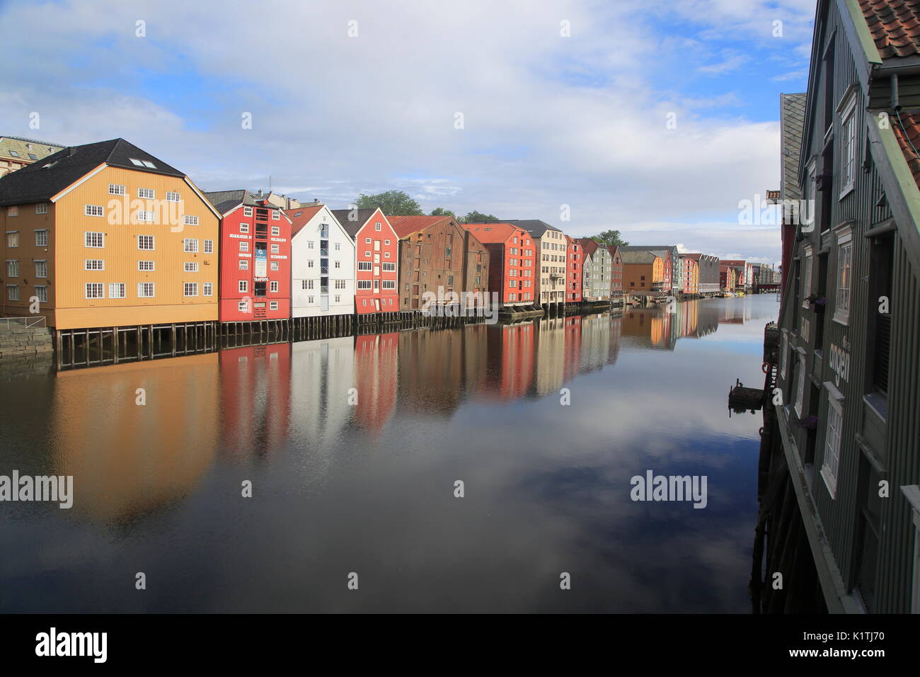 Historic waterside warehouse buildings on River Nidelva, Bryggene ...