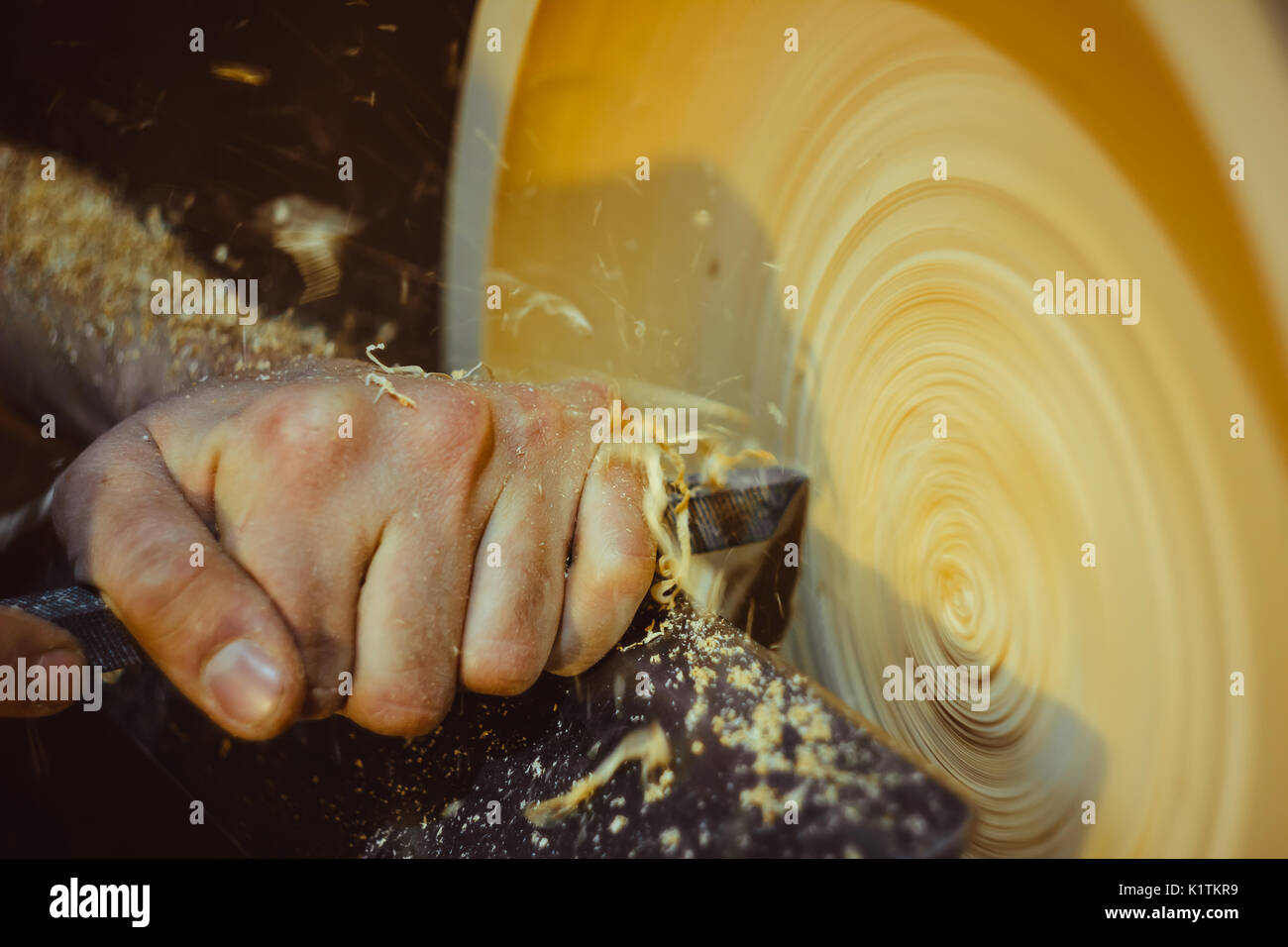 Adult hands turning wood hi-res stock photography and images - Alamy