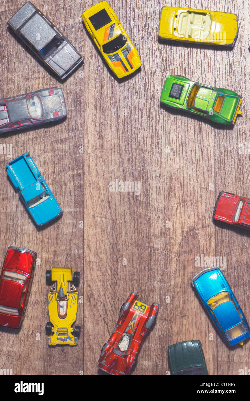 vintage toy cars on a wooden background Stock Photo - Alamy