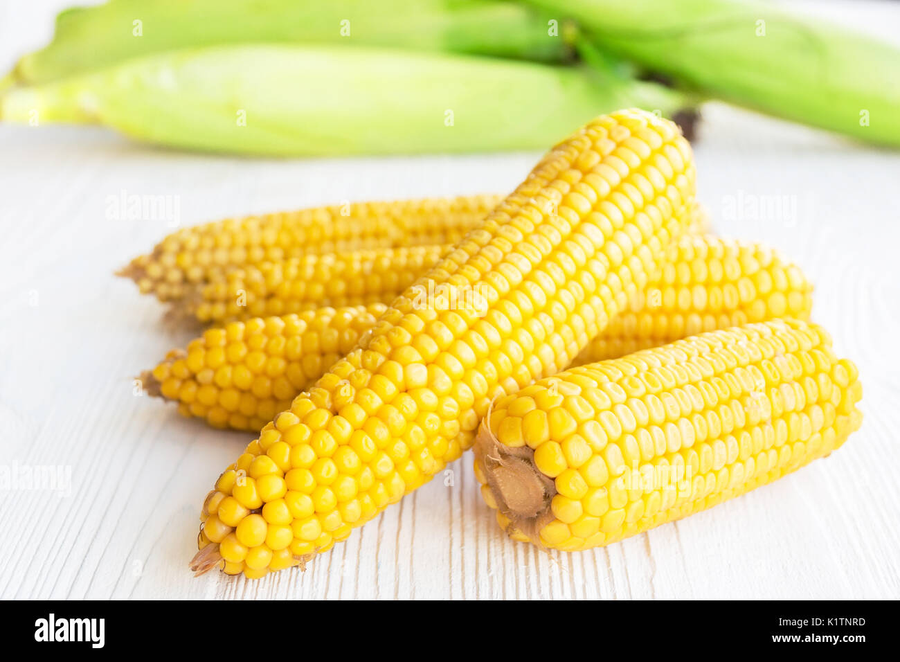 Boiled corn on white background, vitamins, diet Stock Photo - Alamy