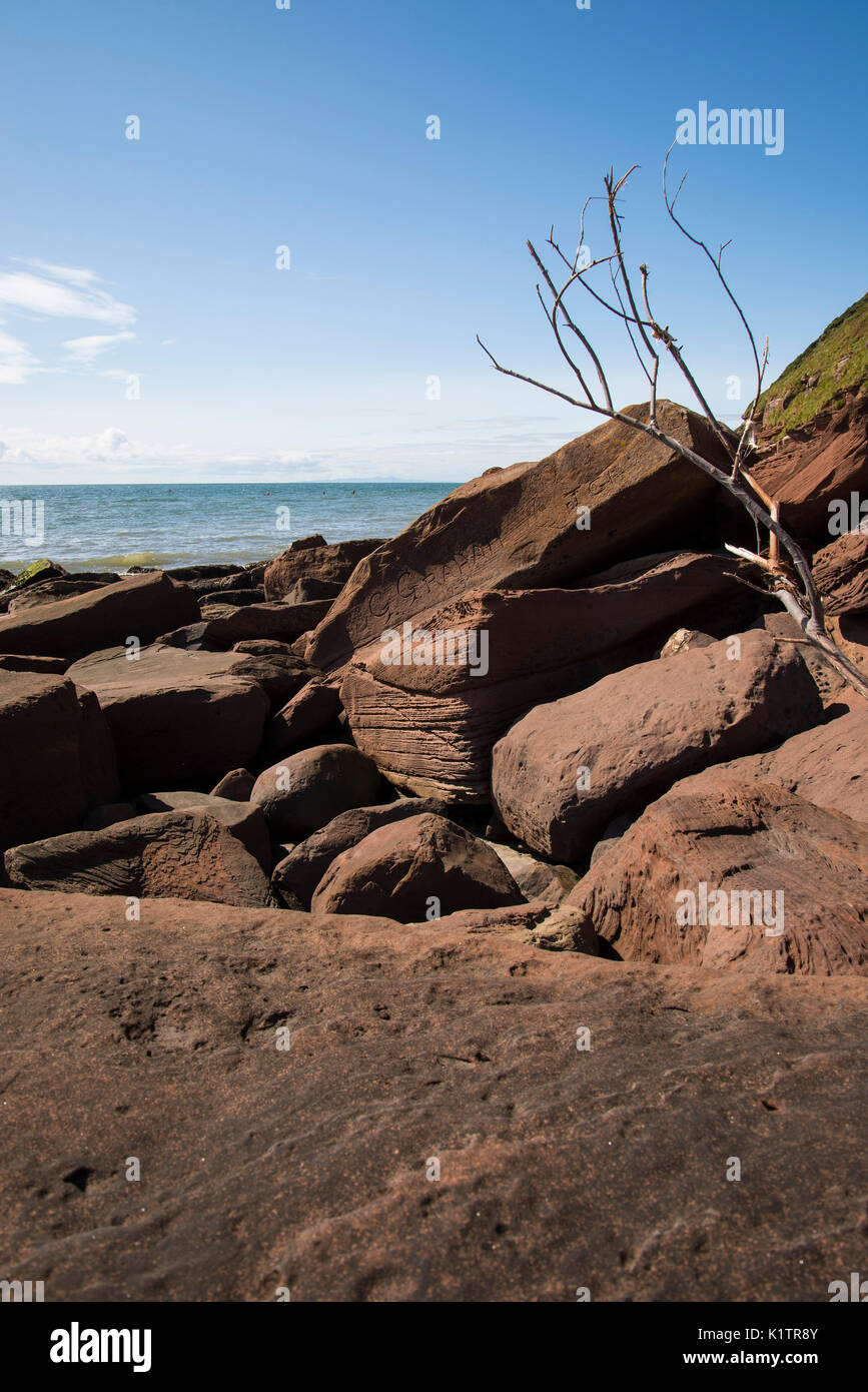 Beach scene large rocks hi-res stock photography and images - Alamy