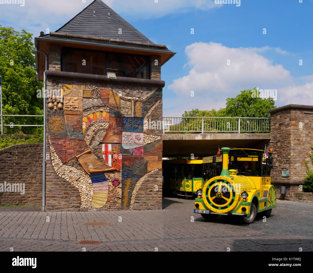 Sightseeing train and wall mosaic by Carlfritz Nicolay depicting the ...