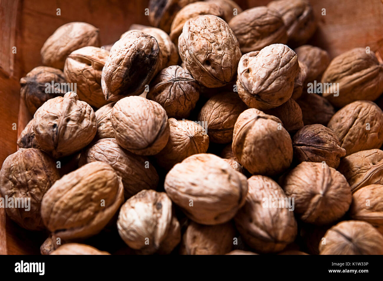 Nuts stacked in a pile Stock Photo - Alamy