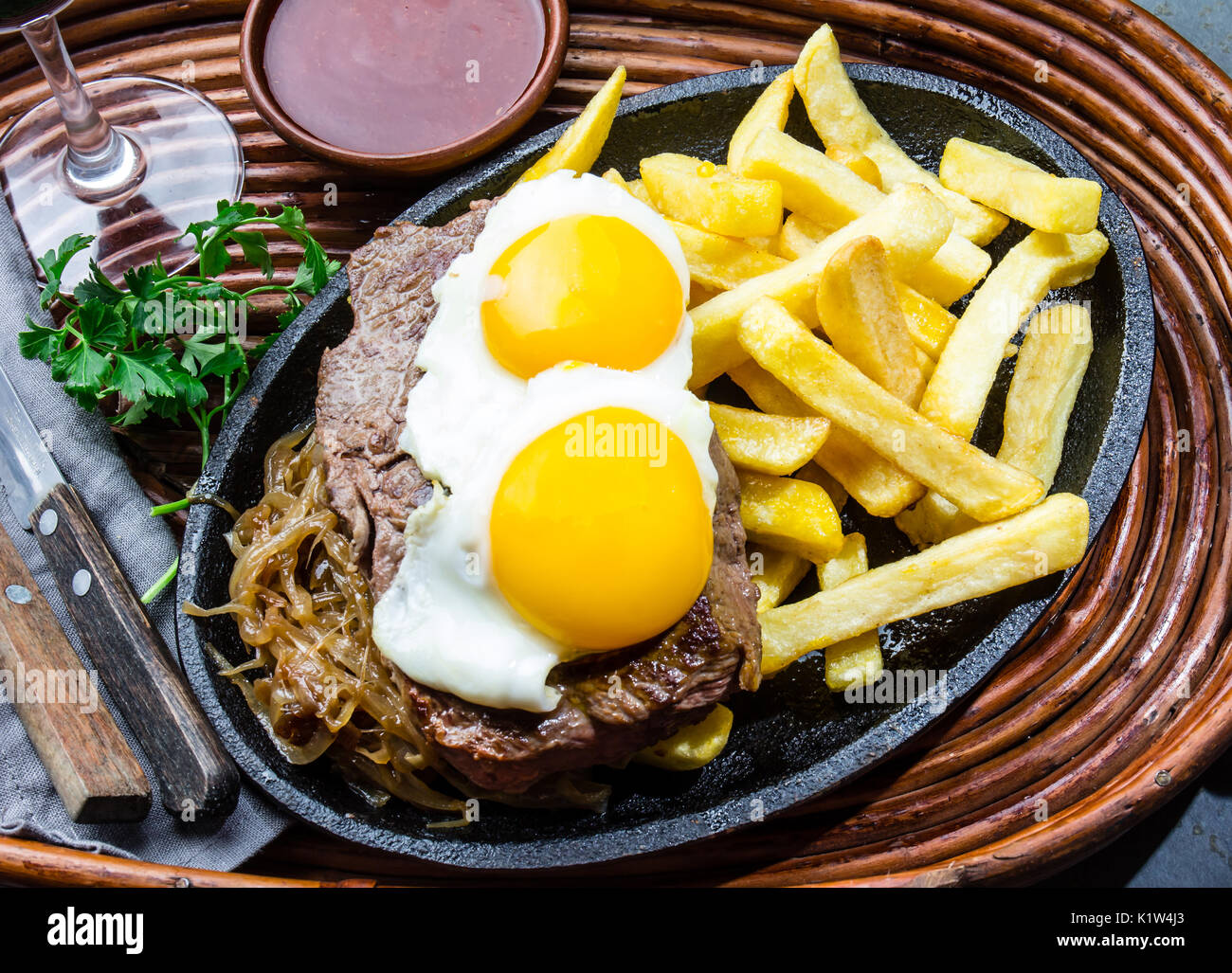 Peruvian Latin American food. Lomo a lo pobre. Beef tenderloin whit ...
