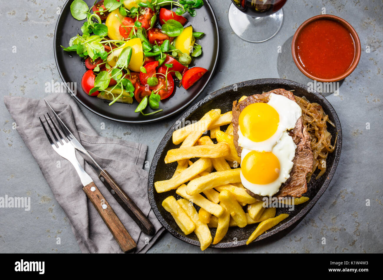 Peruvian Latin American food. Lomo a lo pobre. Beef tenderloin whit ...