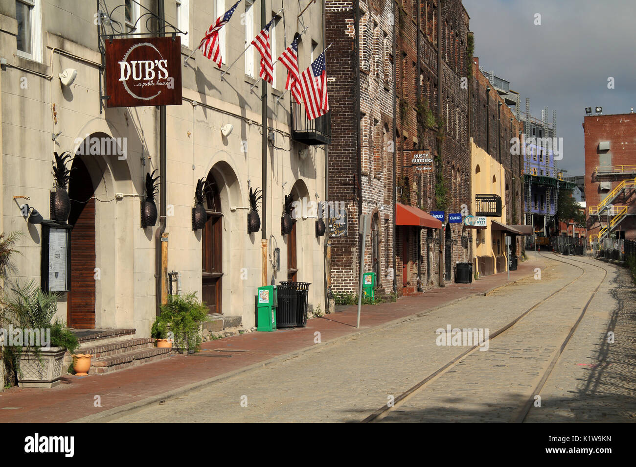 Old historic market street with brick buildings hi-res stock ...