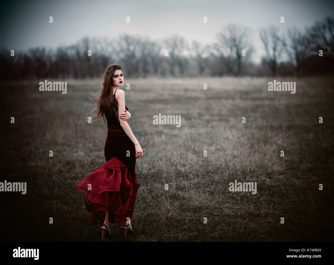 Back view lonely girl in hi-res stock photography and images - Alamy