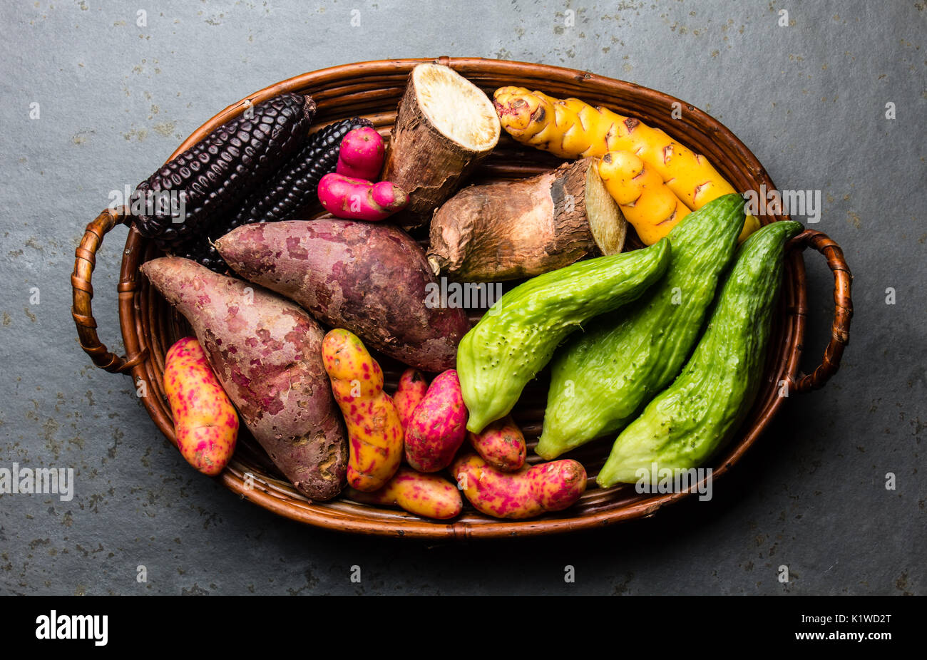 Fresh peruvian Latin American vegetables caigua, sweet potatoes, black ...