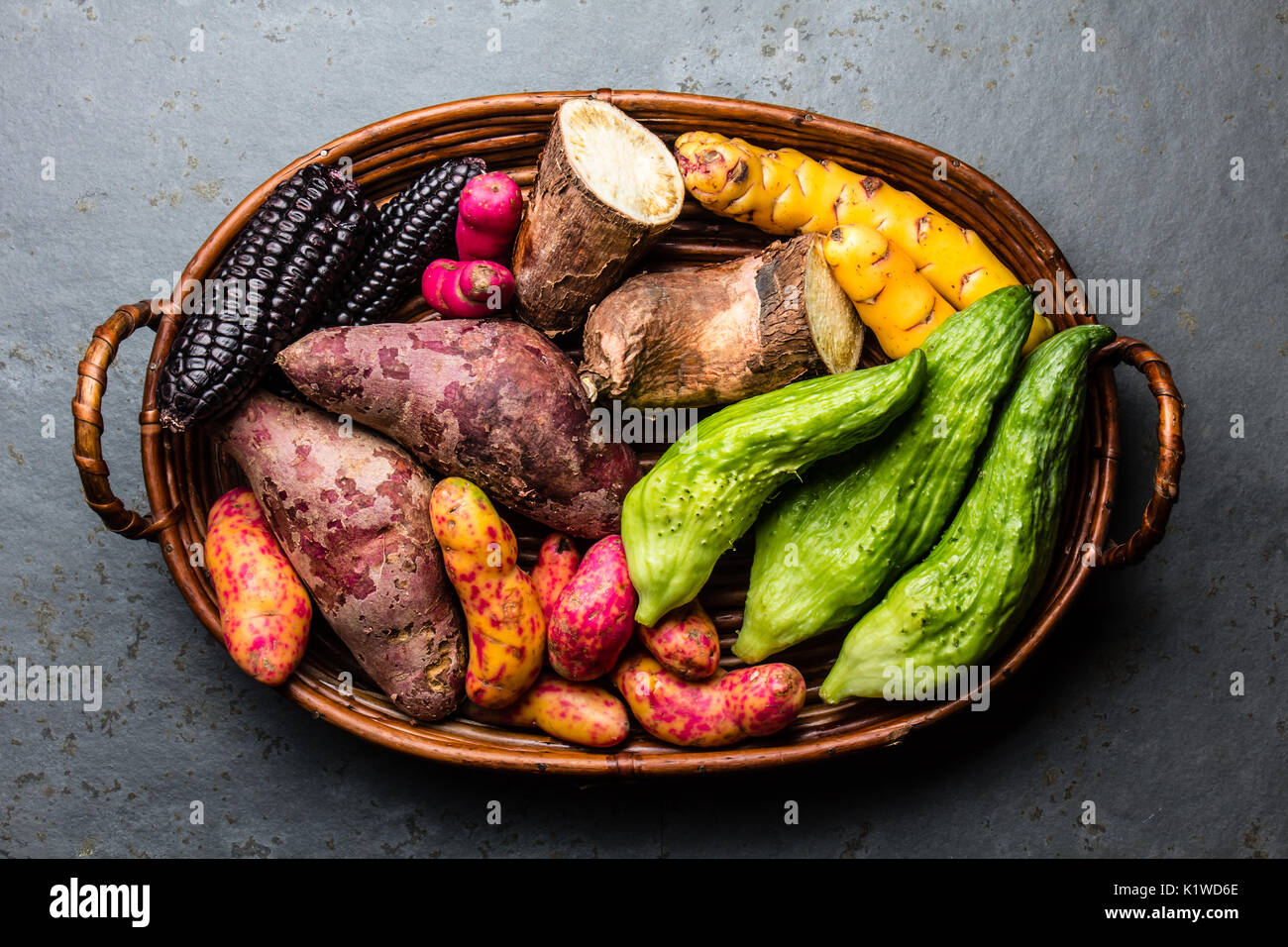 Fresh peruvian Latin American vegetables caigua, sweet potatoes, black ...