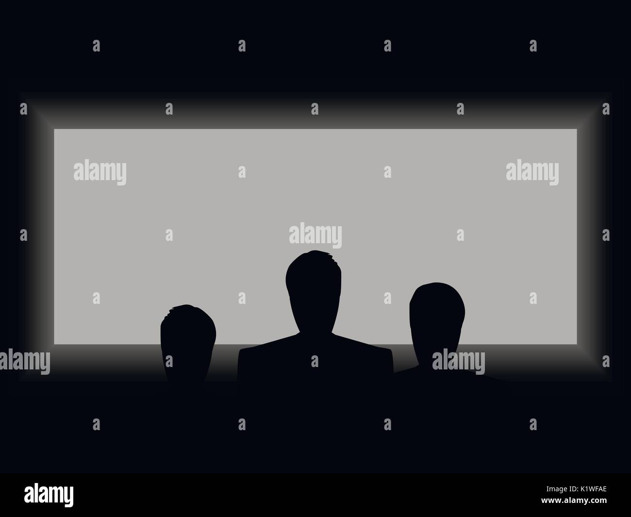 Cinema, theater light from the screen. Shadows of people on the ...