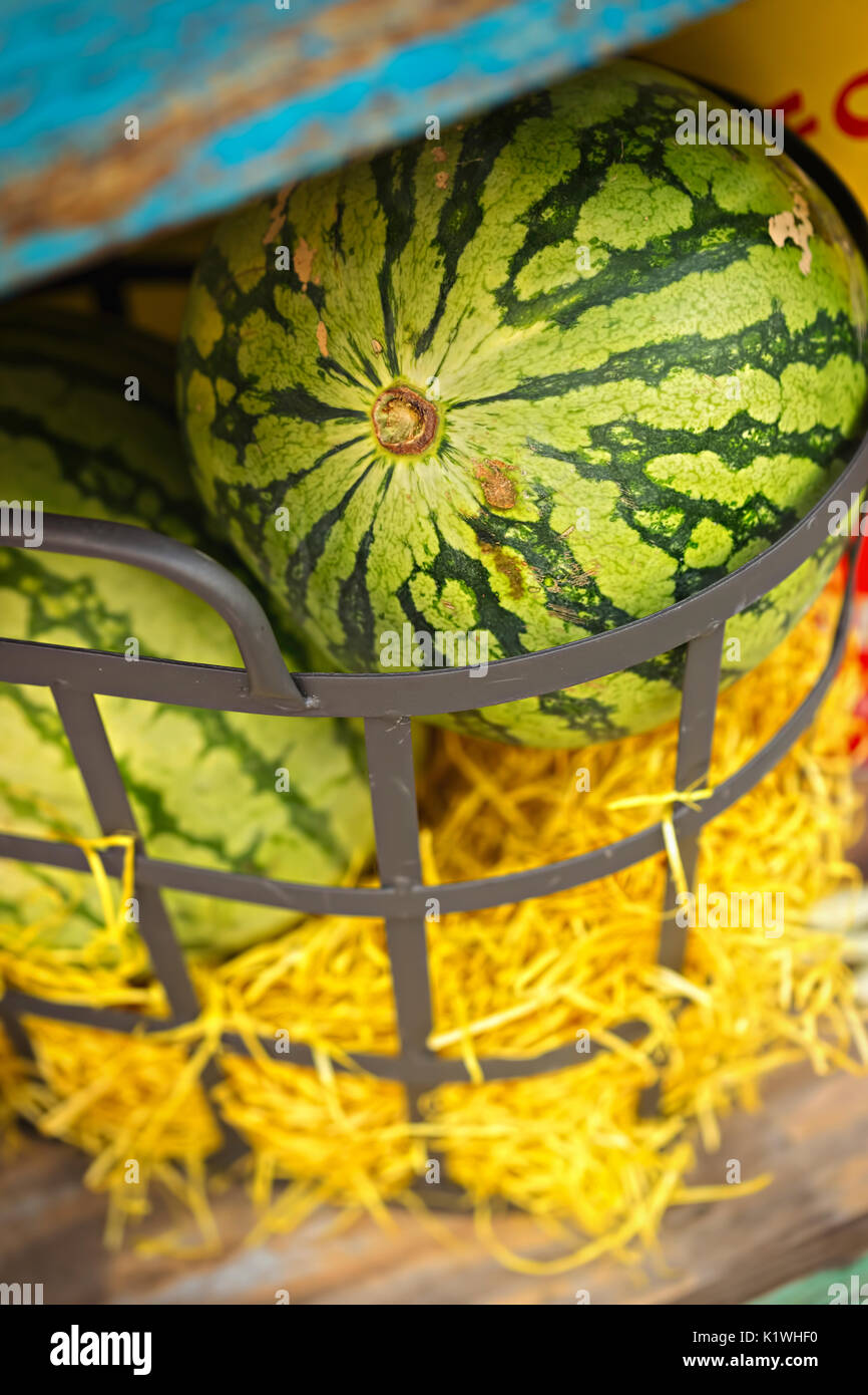 Watermelons in the basket on street food stall Stock Photo - Alamy
