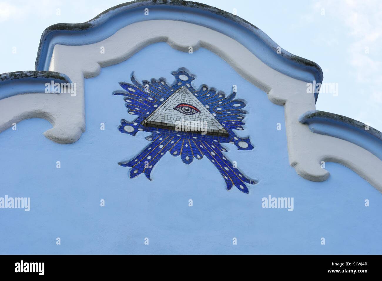 Evil eye detail from blue church Bratislava Slovakia Stock Photo - Alamy