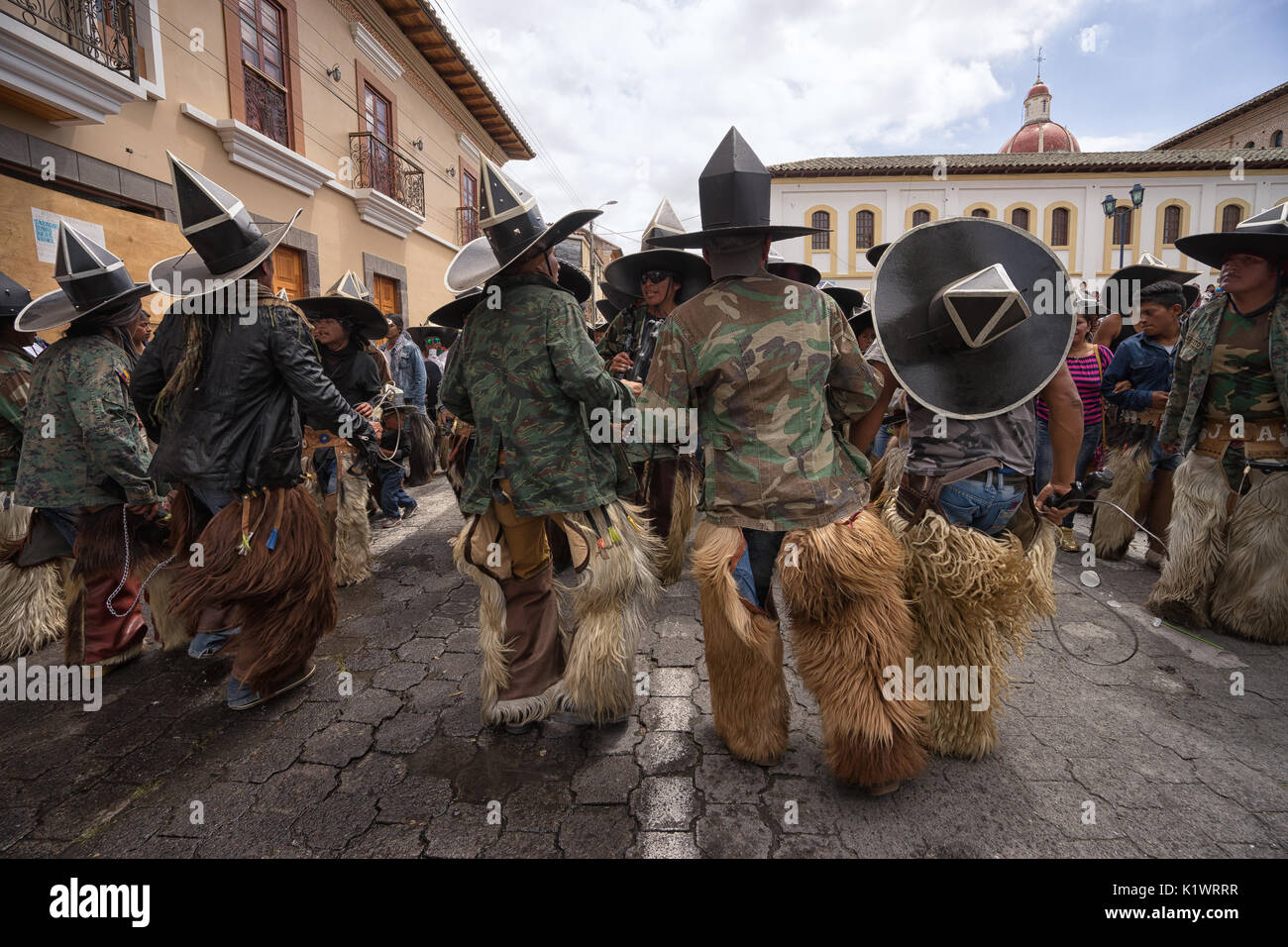 June 24, 2017 Cotacachi, Ecuador: indigenous kichwa men wearing chaps ...