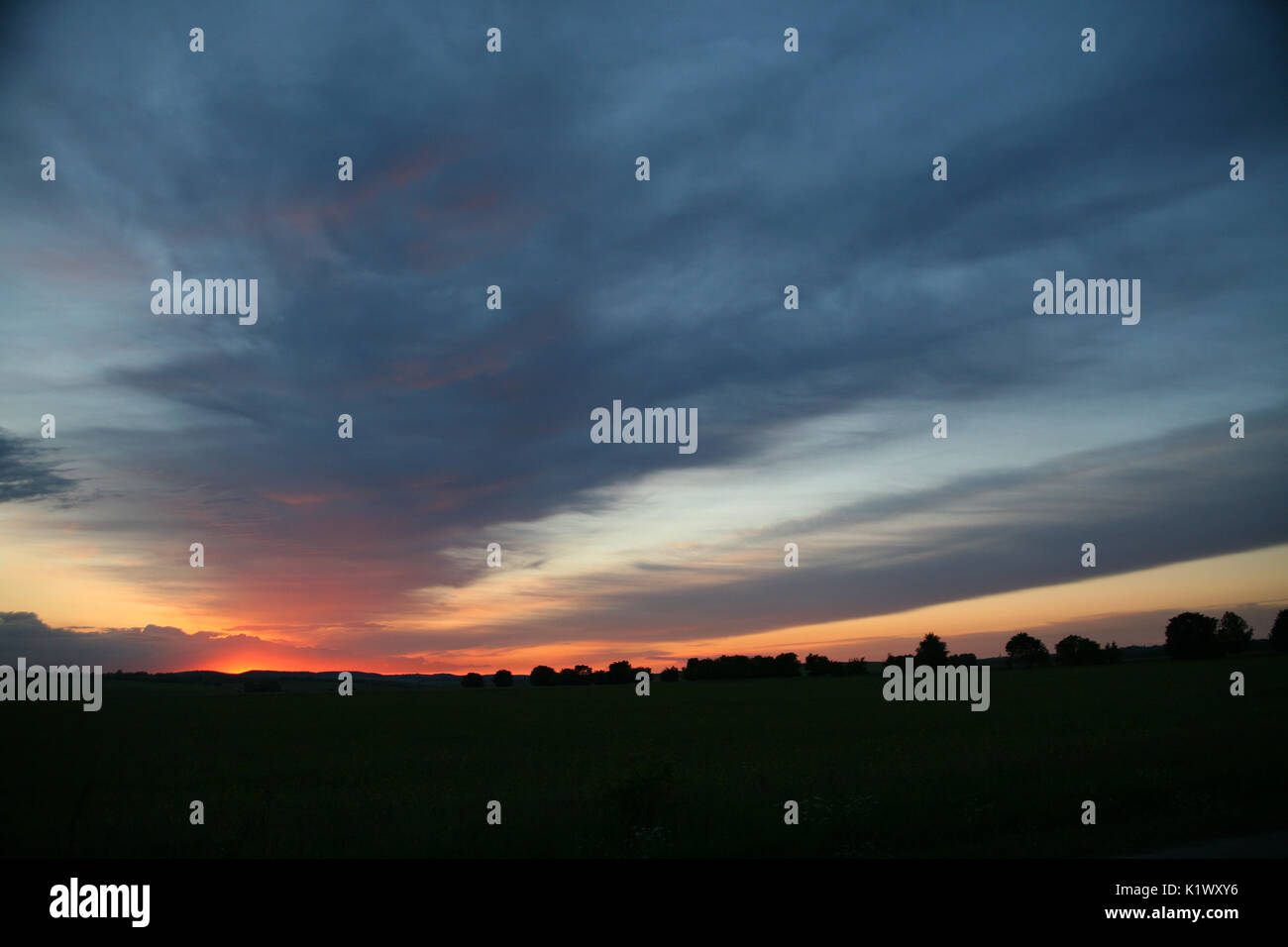 Natural Sunset Sunrise Sun Over Skyline, Horizon. Warm Colours Stock ...