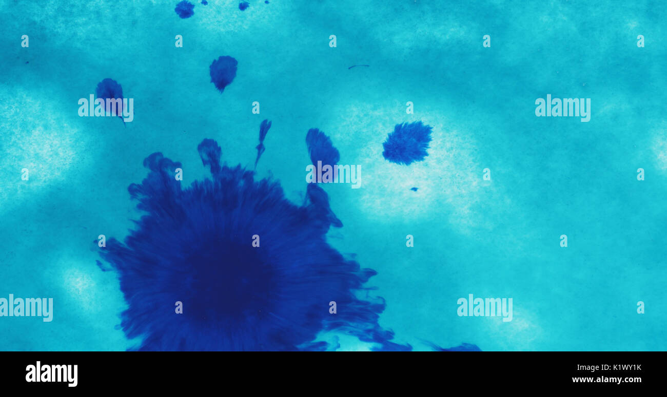turquoise blue ink drop on wet white paper top view, wide photo Stock ...