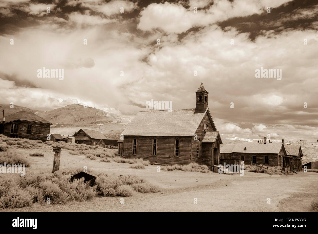 Wooden Methodist church on streets o Bodie Historic State Park wooden buildings in sepia Stock ...