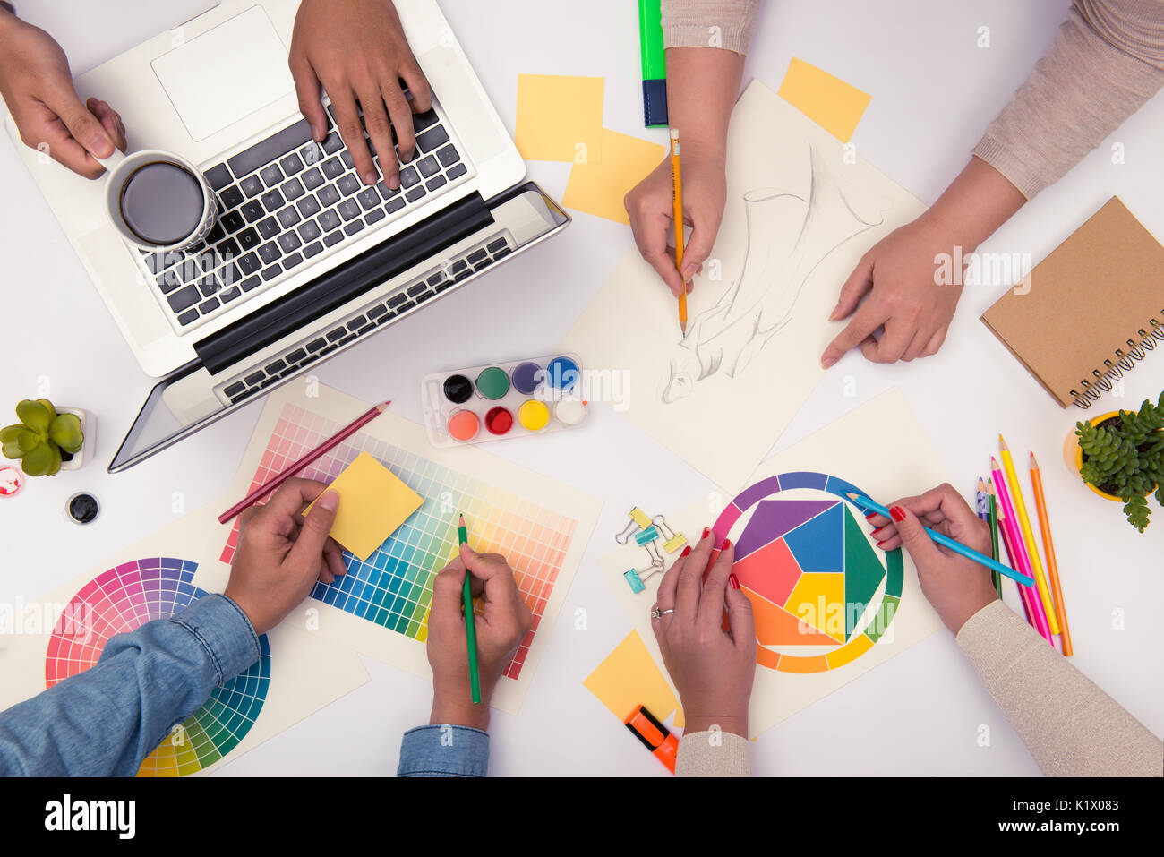 Concept of designer teamwork brainstorming planning meeting Stock Photo ...