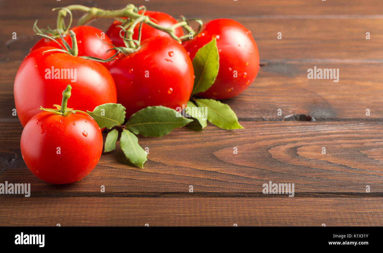 Wet tomatoes on table hi-res stock photography and images - Alamy