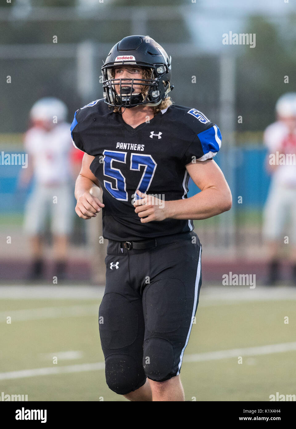 Football action with Trinity vs. University Prep High School in Redding ...