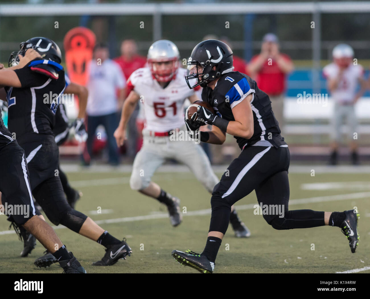 Football action with Trinity vs. University Prep High School in Redding ...