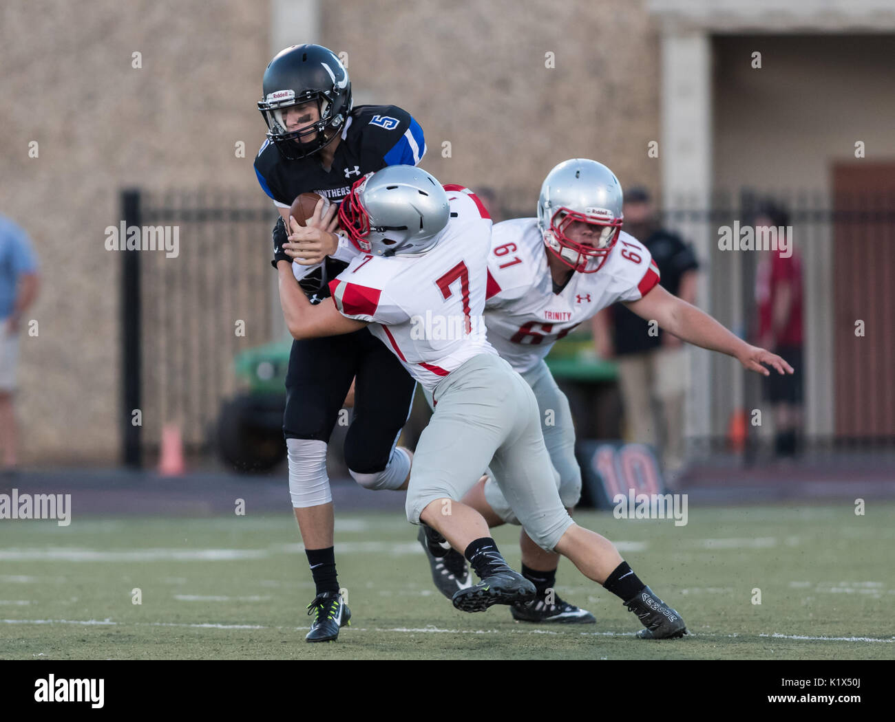 Football action with Trinity vs. University Prep High School in Redding ...