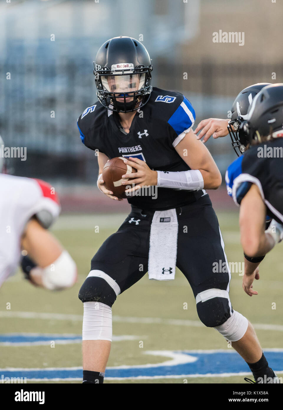 Football action with Trinity vs. University Prep High School in Redding ...