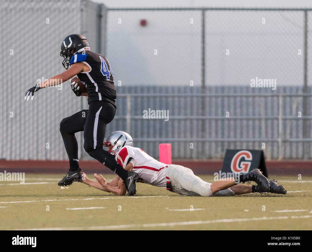 Football action with Trinity vs. University Prep High School in Redding ...