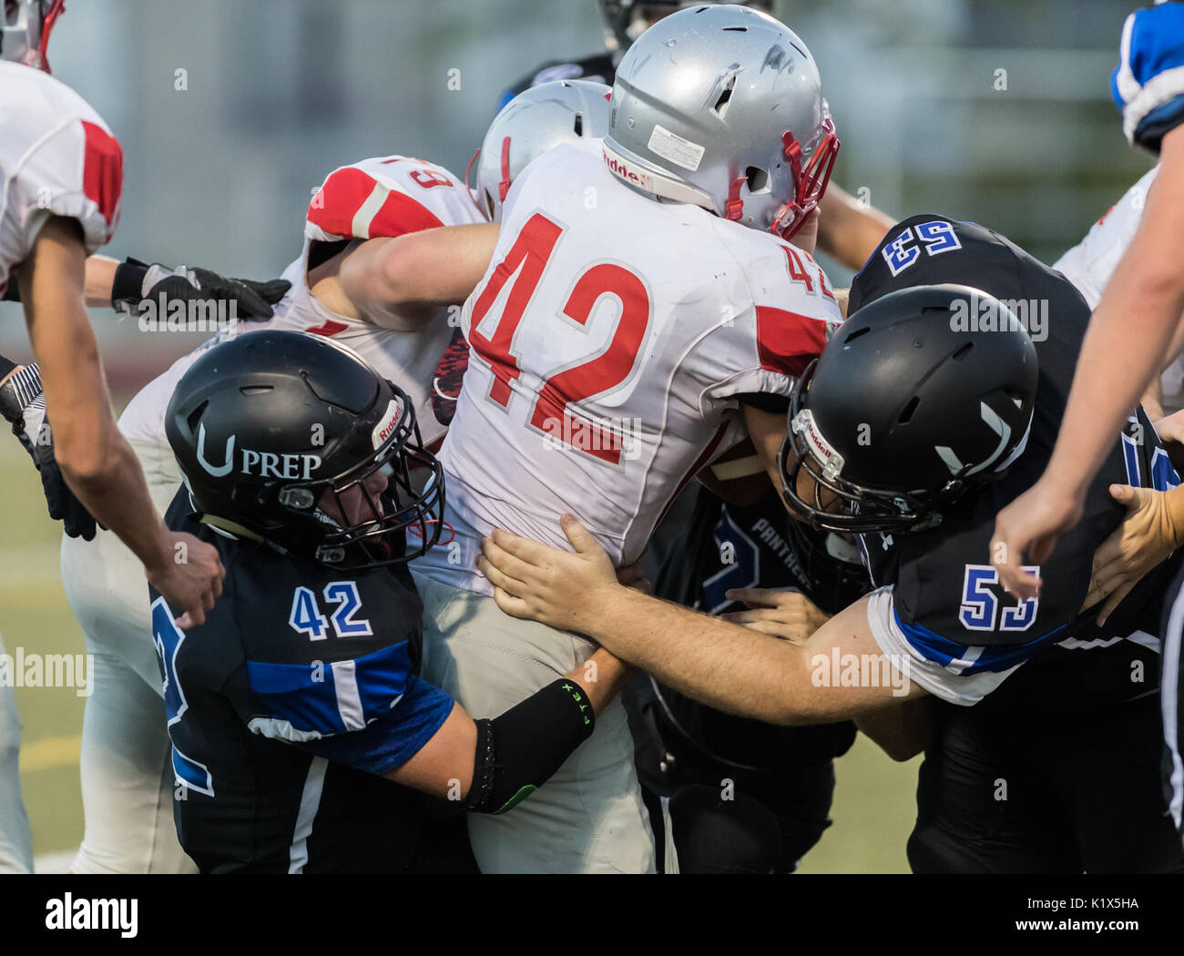 Football action with Trinity vs. University Prep High School in Redding ...
