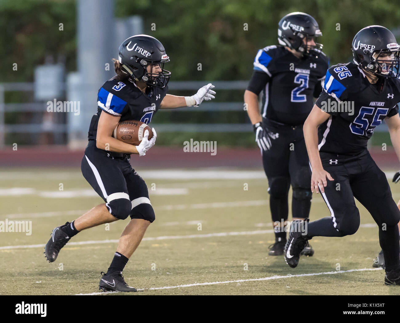 Football action with Trinity vs. University Prep High School in Redding ...