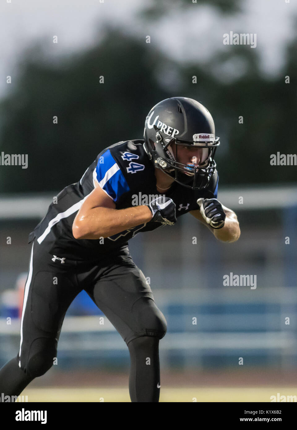 Football action with Trinity vs. University Prep High School in Redding ...