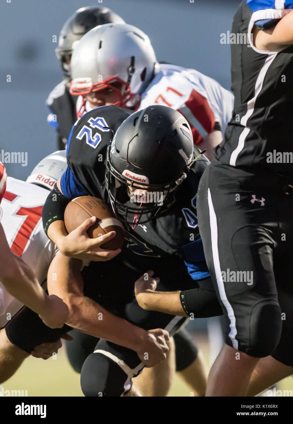 Football action with Trinity vs. University Prep High School in Redding ...