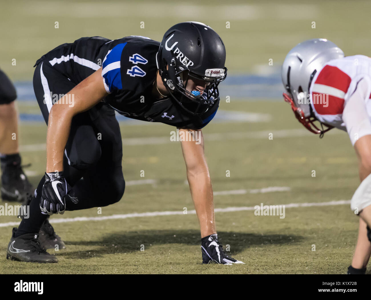 Football action with Trinity vs. University Prep High School in Redding ...