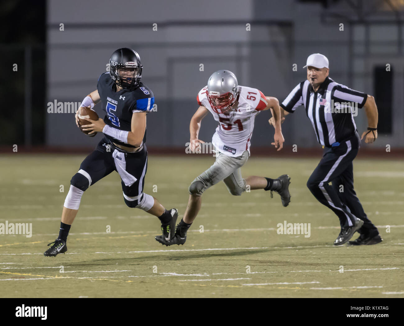 Football action with Trinity vs. University Prep High School in Redding ...