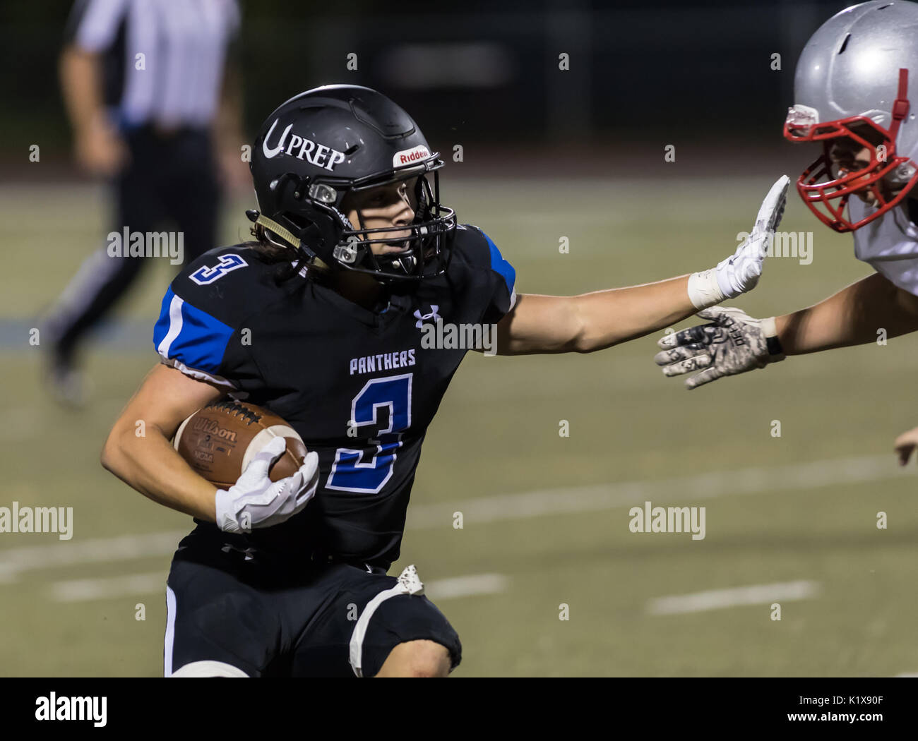 Football action with Trinity vs. University Prep High School in Redding ...