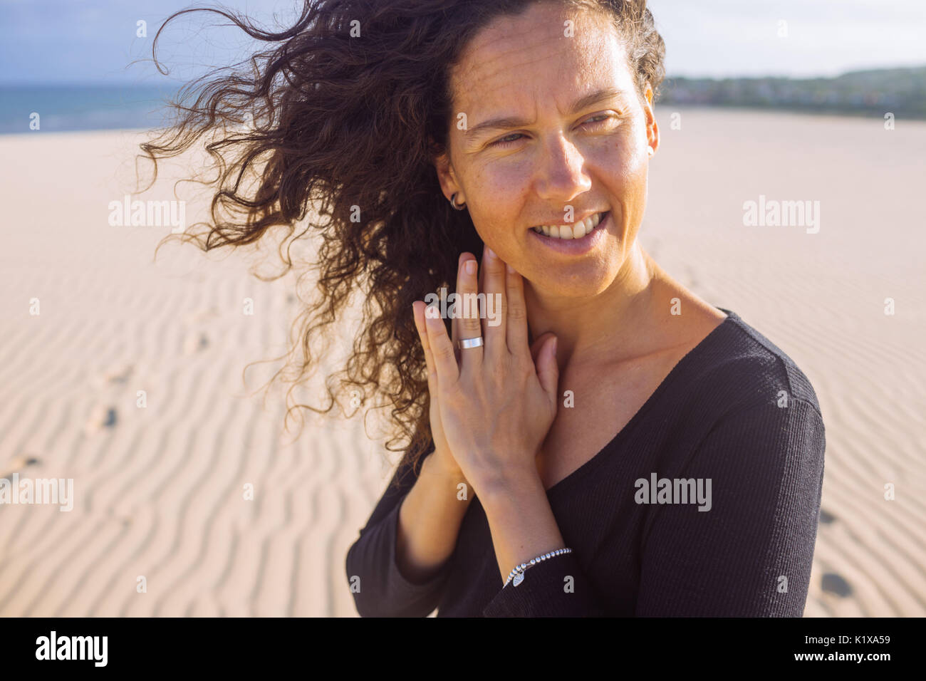 Hair wind curly hi-res stock photography and images - Alamy
