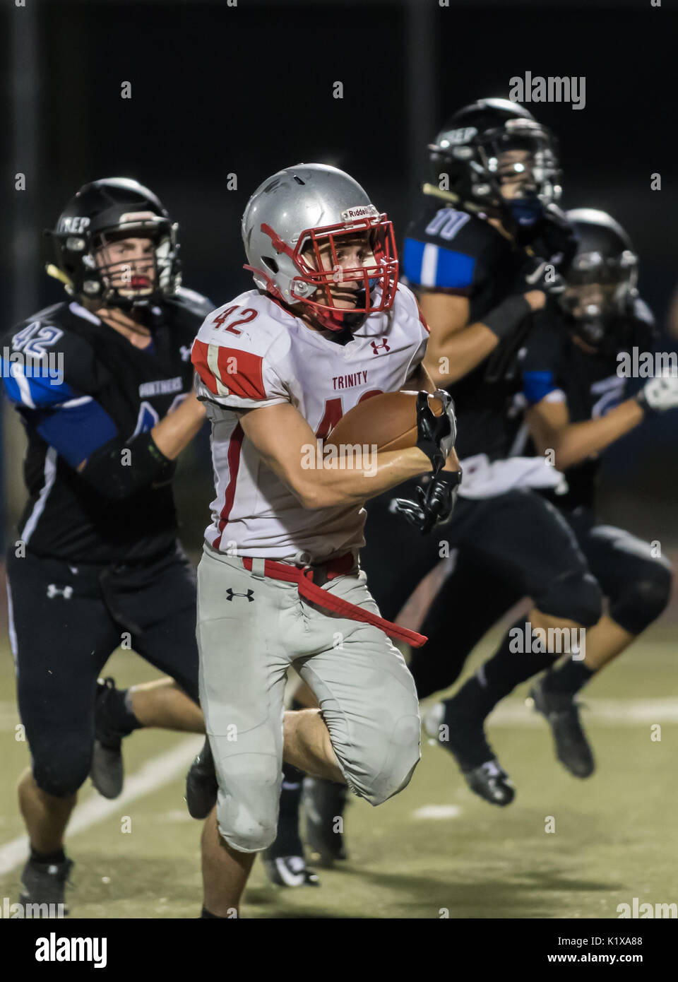 Football action with Trinity vs. University Prep High School in Redding ...