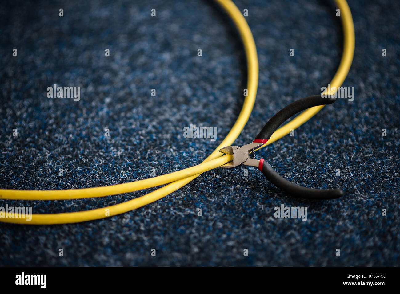 Red black wire cable cutter hi-res stock photography and images - Alamy