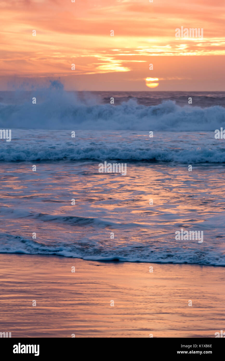 Portrait Picture of Ocean Wave at Sunrise Stock Photo - Alamy