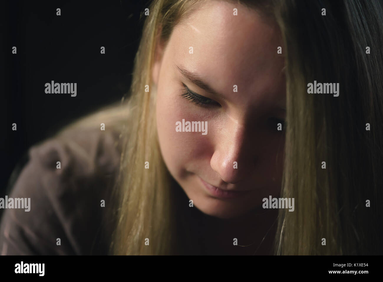 Girl face looking computer screen hi-res stock photography and images ...