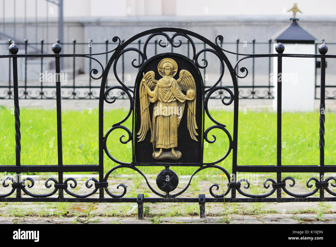 Image of an angel on a metal fence on the territory of the Orthodox ...