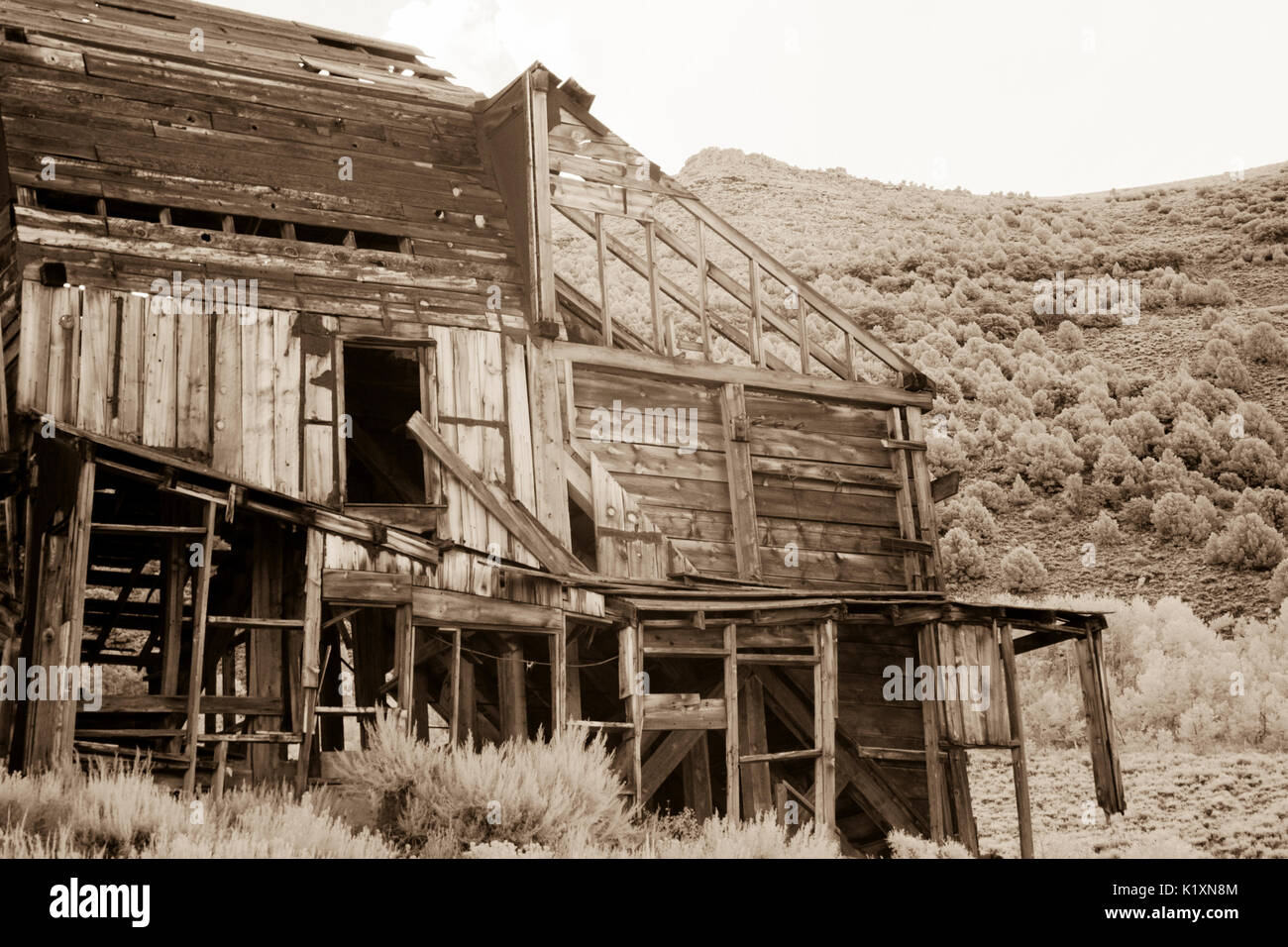 Wooden buildings of Masonic Chemung mine in black and white Stock Photo ...
